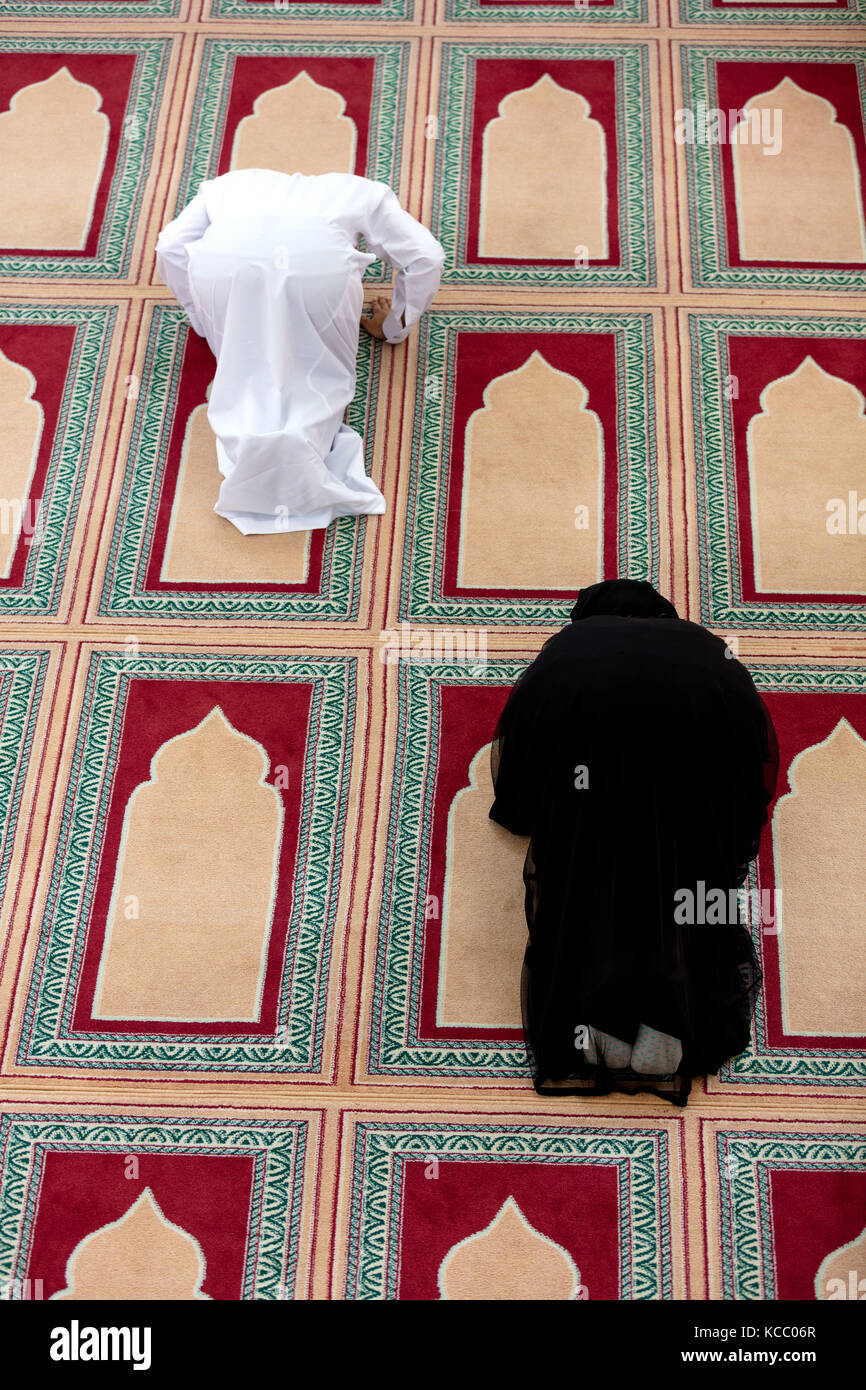 top view of Muslim man and woman praying in mosque Stock Photo - Alamy