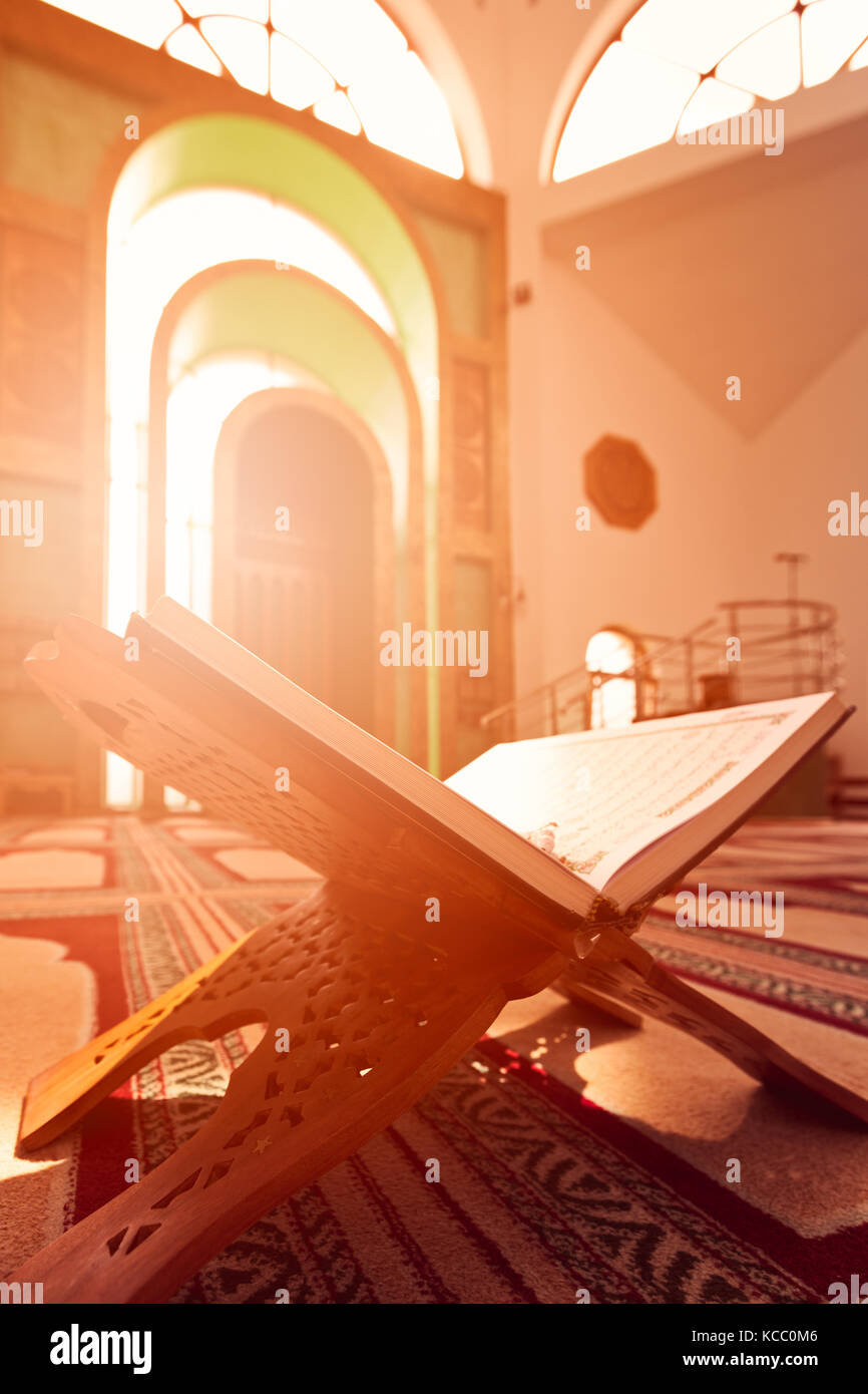 Quran in the mosque - open for prayers Stock Photo - Alamy