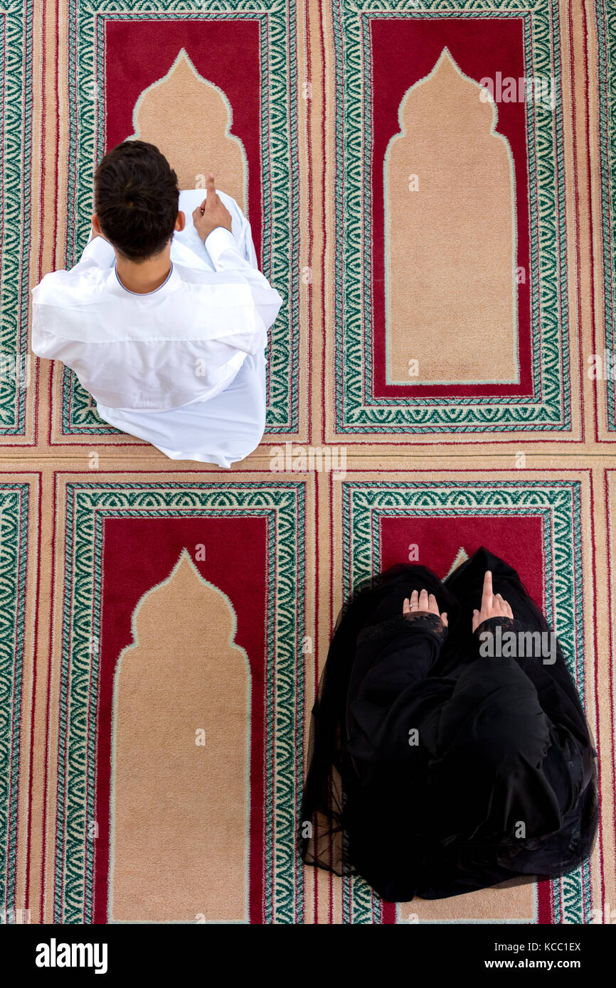 top view of Muslim man and woman praying in mosque Stock Photo - Alamy