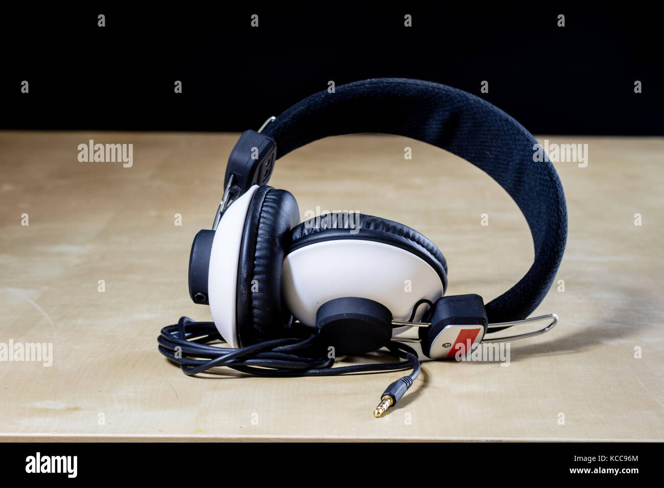 headphones for listening to music. Old good music from the 80s. Wooden ...