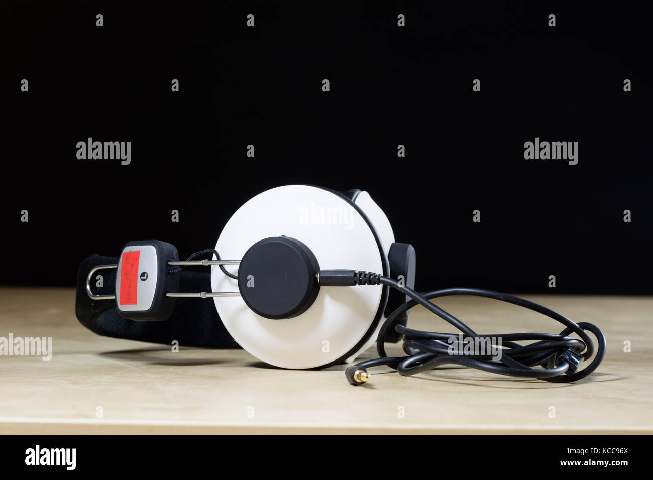 headphones for listening to music. Old good music from the 80s. Wooden ...