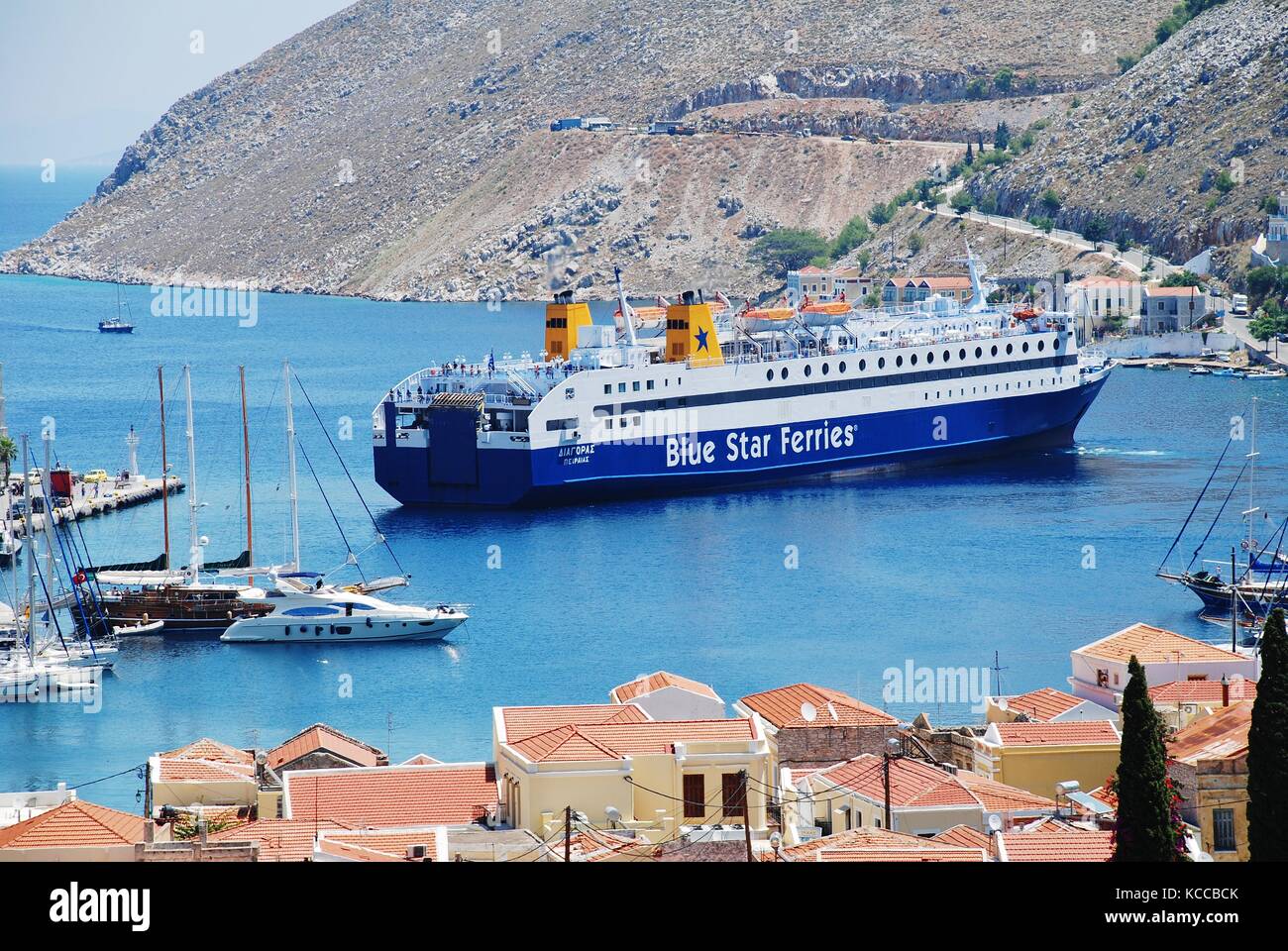 Blue Star Ferries ferry boat Diagoras docking at Yialos harbour on the ...