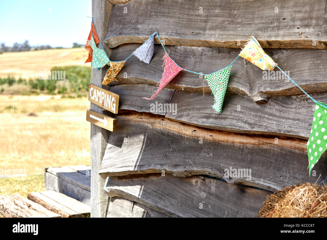 Slats of wood with hand cut bunting Stock Photo - Alamy