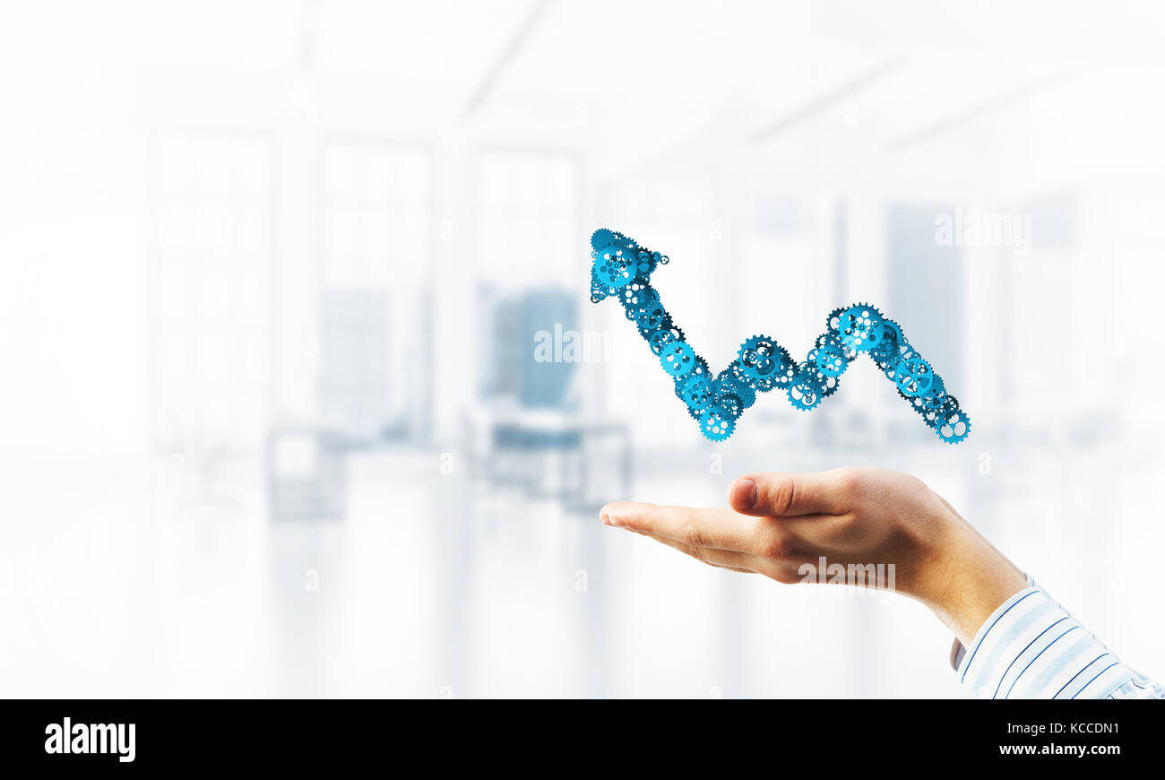 Progressing graph presented in male palms as symbol of success and ...