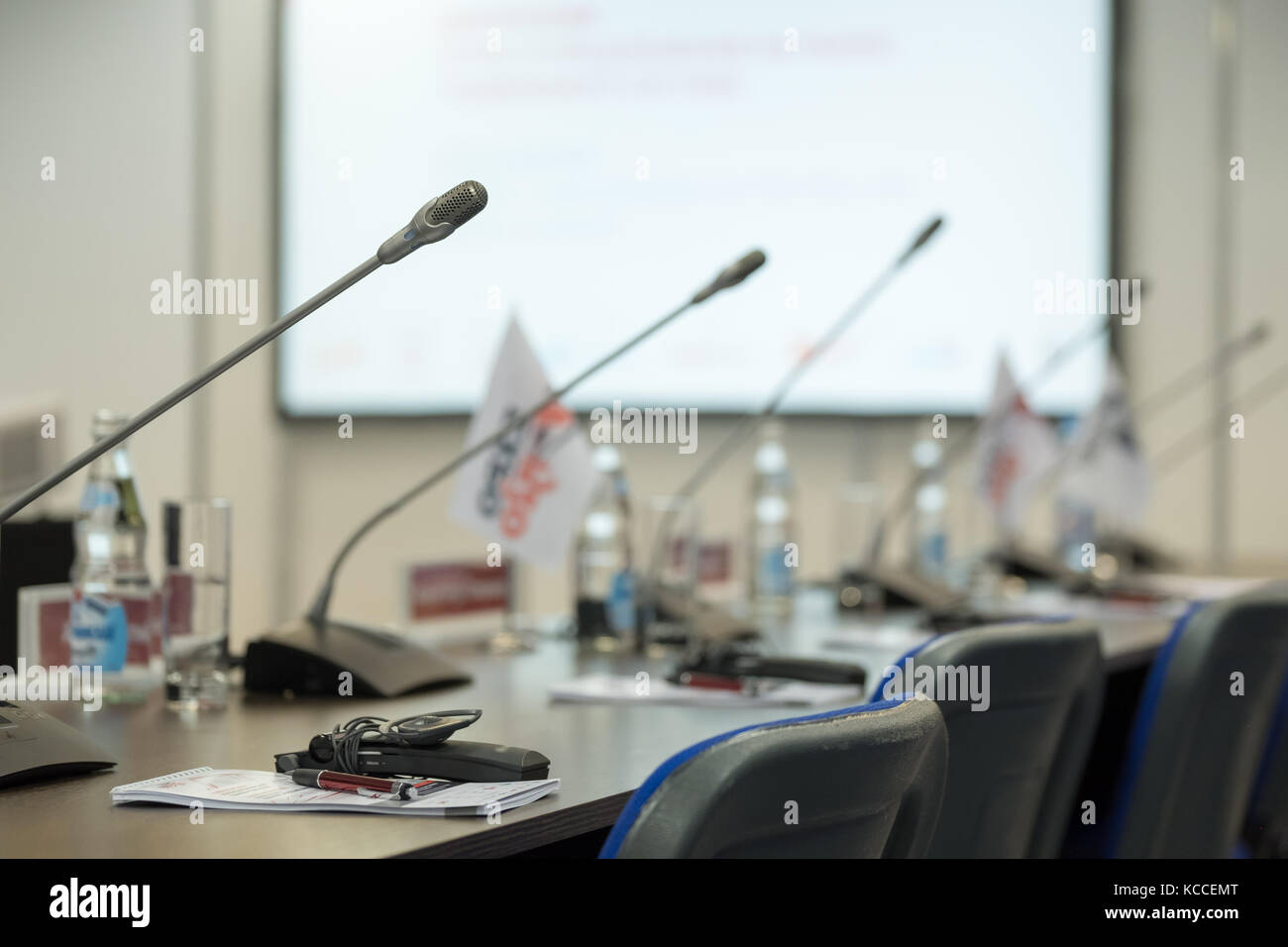 Table microphones at the conference hall Stock Photo - Alamy