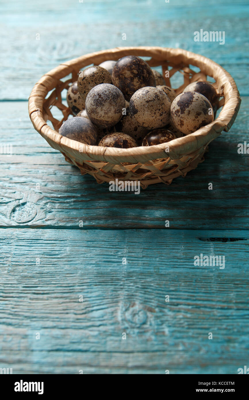 Photo of blue surface with quail eggs Stock Photo - Alamy
