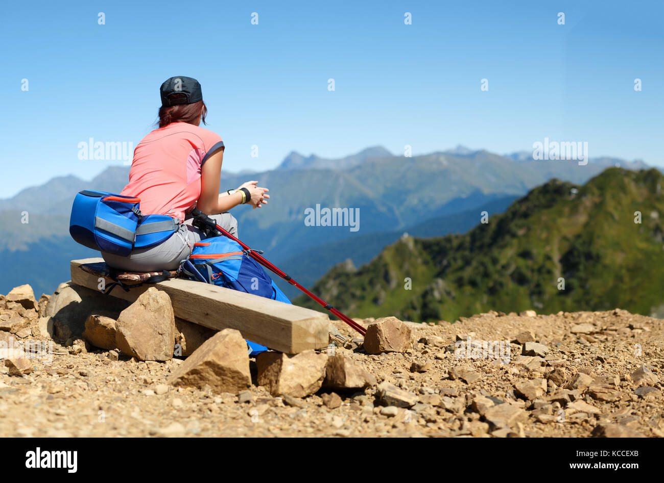 Image from back of woman with sticks for sport walk Stock Photo - Alamy
