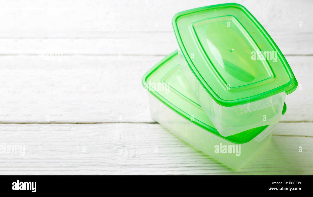Photo of two containers with green lid Stock Photo - Alamy
