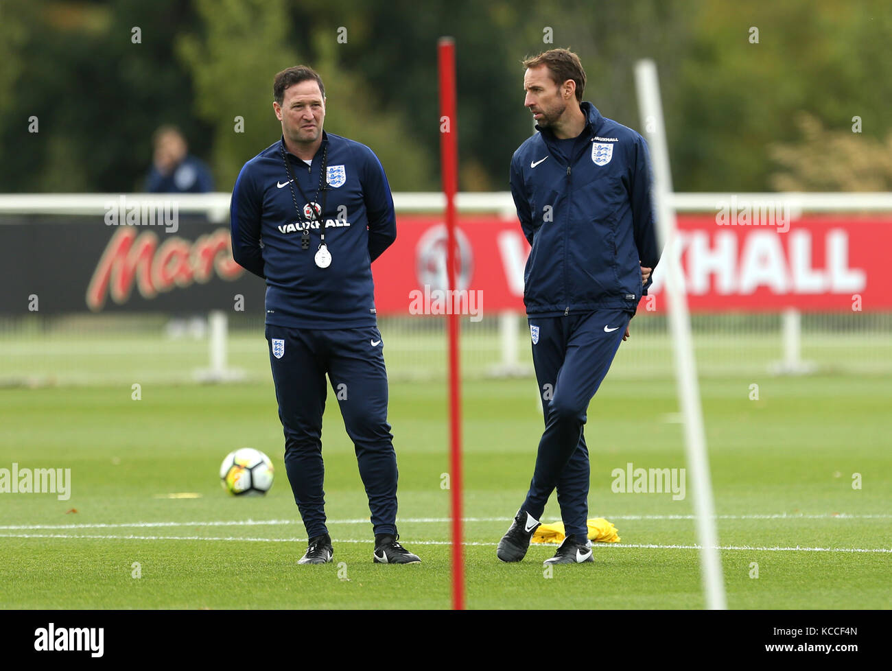 England manager Gareth Southgate (right) during the training session at ...