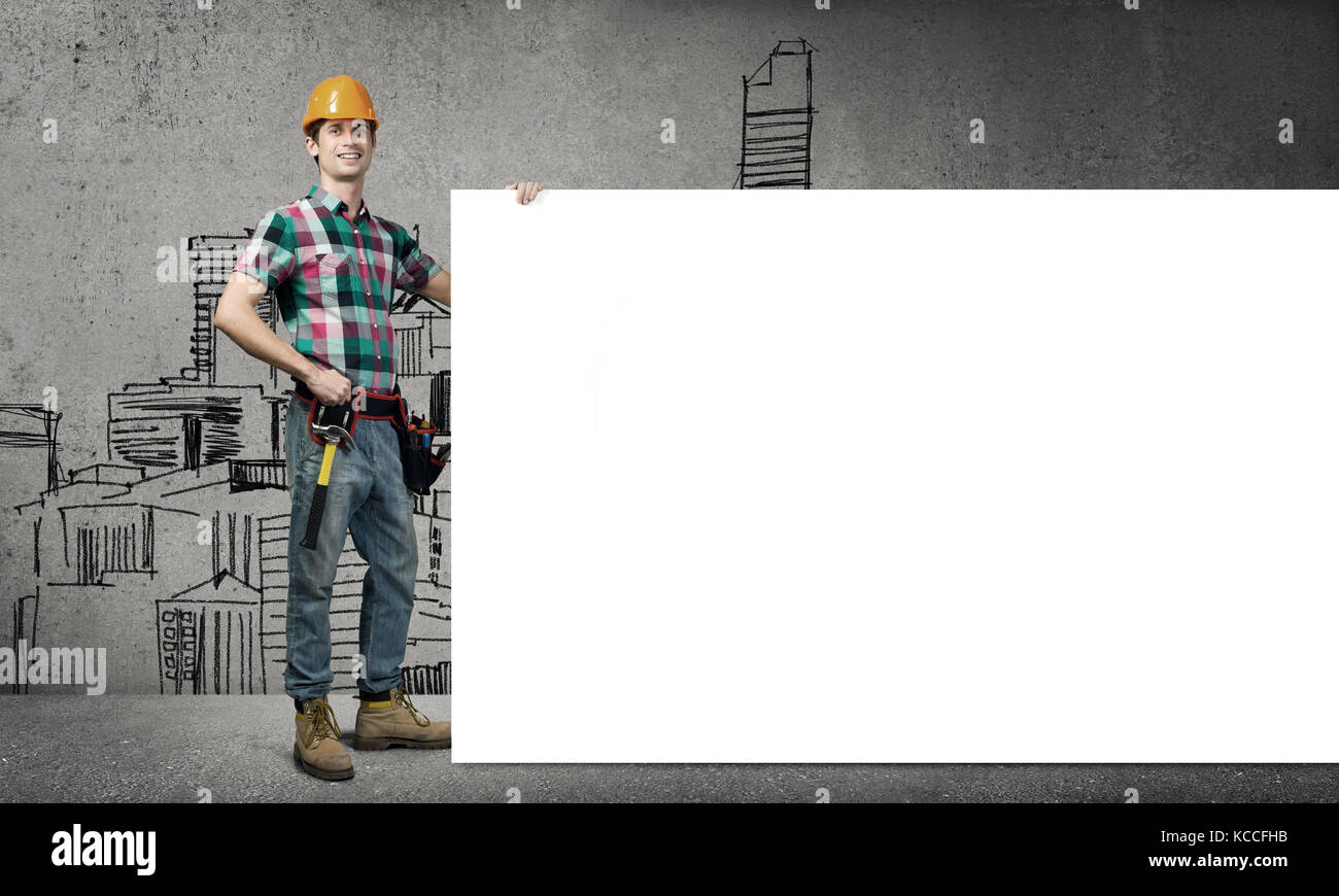 Repairman demonstrating banner Stock Photo - Alamy