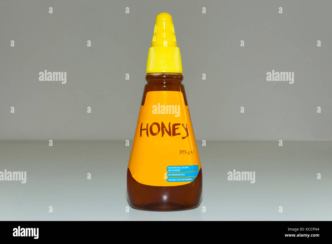 Honey Squeeze Bottle Stock Photo - Alamy Honey Squeeze Bottle Stock Photo - Alamy