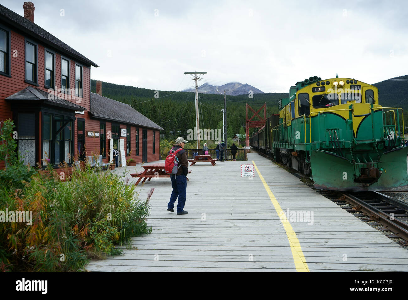 Train arriing at historic Carcross railroad station, Carcross, Yukon ...