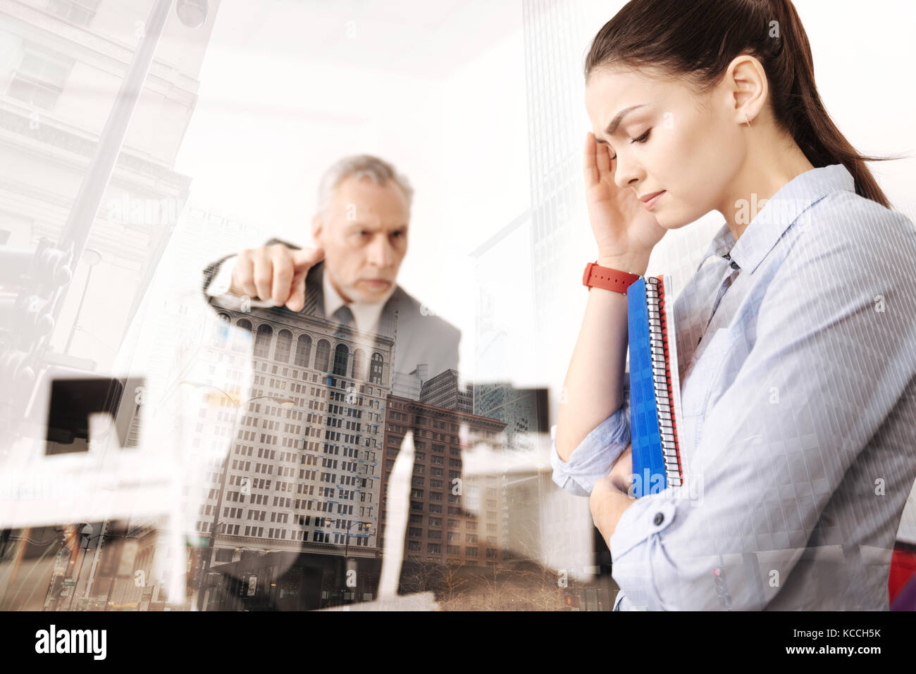 Strict boss arguing with his female employee Stock Photo - Alamy
