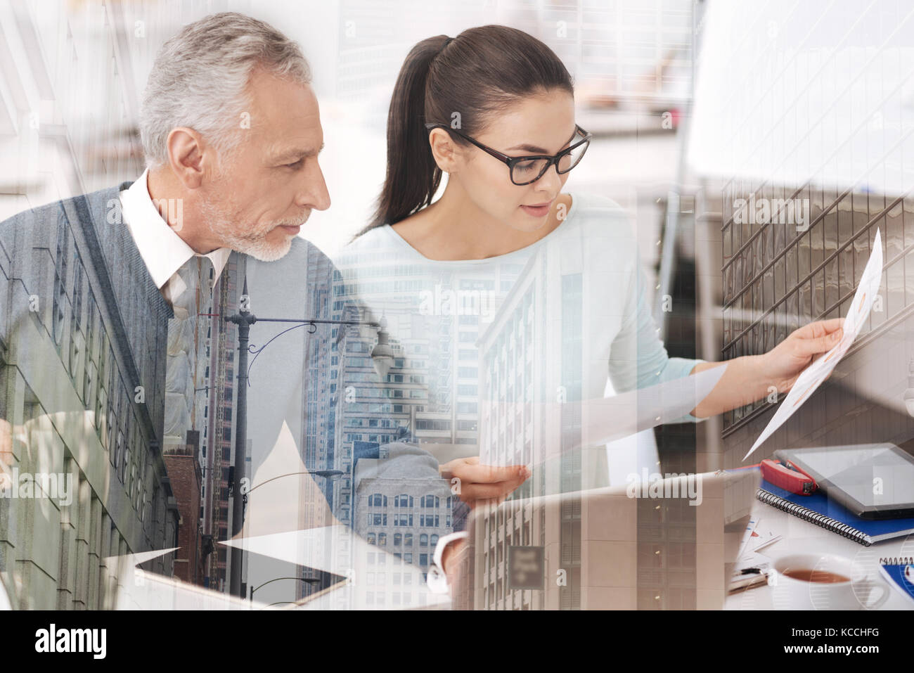 Professional colleagues working on the project together Stock Photo - Alamy
