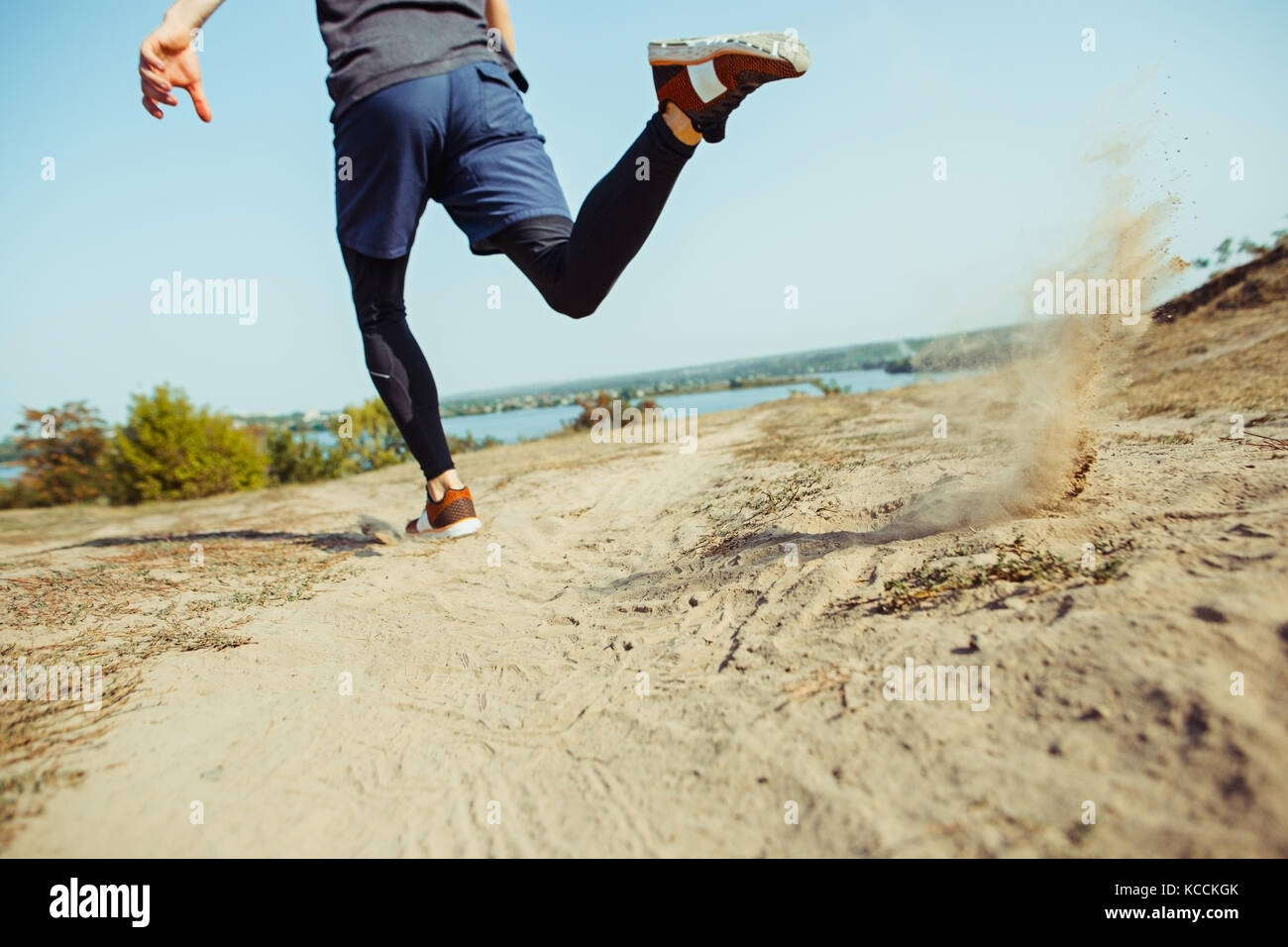 Running sport. Man runner sprinting outdoor in scenic nature. Fit ...