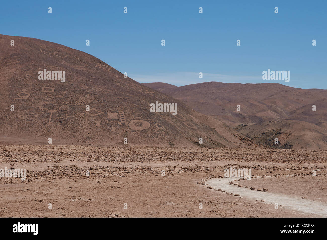 Large group of ancient petroglyphs on the hillsides at Cerro Pintados ...
