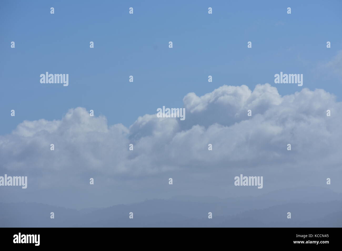 Beautiful landscape mountains fluffy clouds hi-res stock photography ...