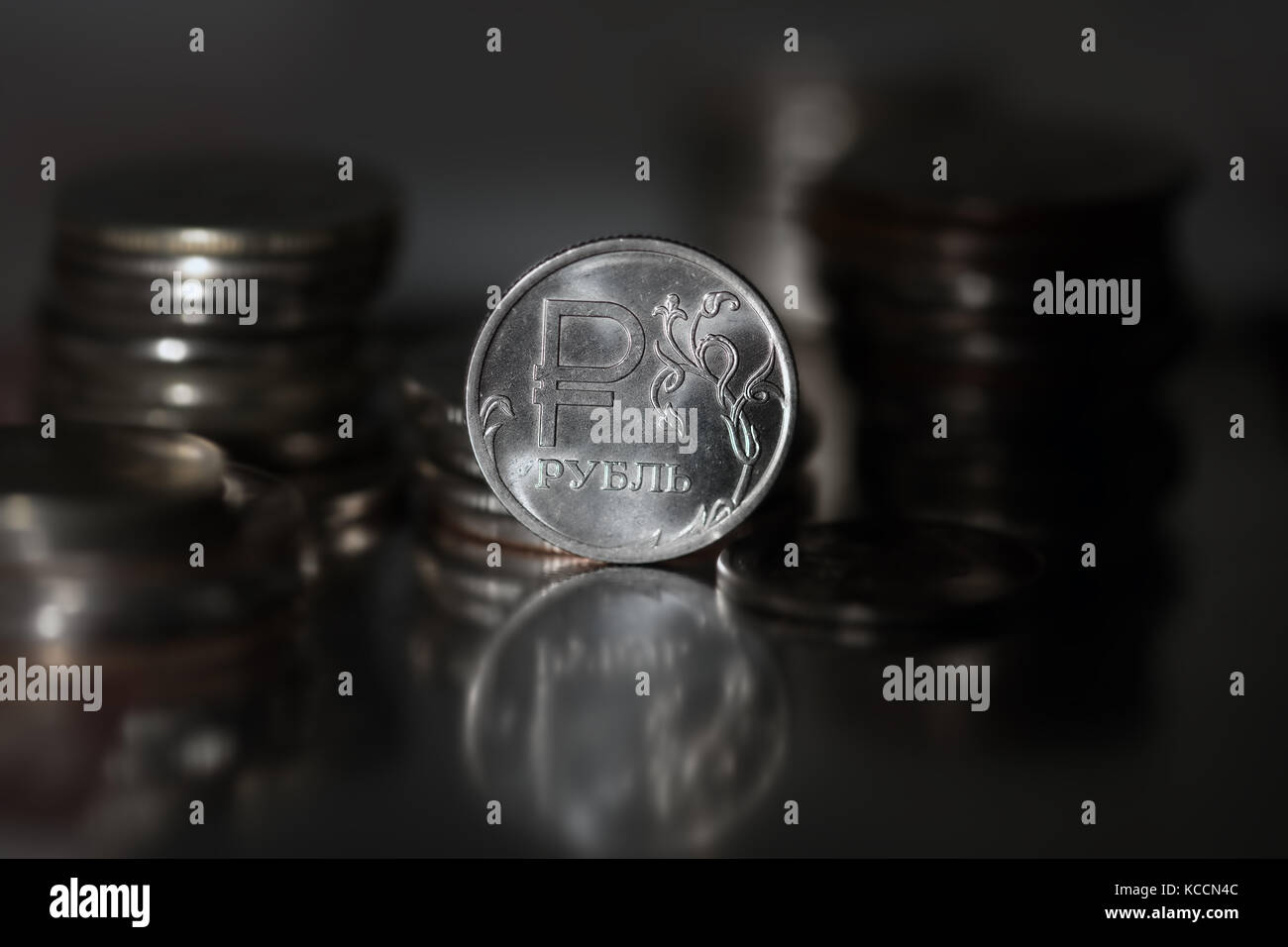 View of stacks of russian rouble coins of different values on black ...