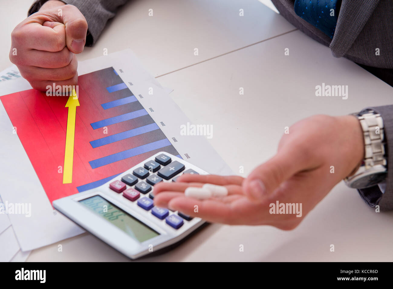 Finance analyst feeling sick due to bad results Stock Photo - Alamy