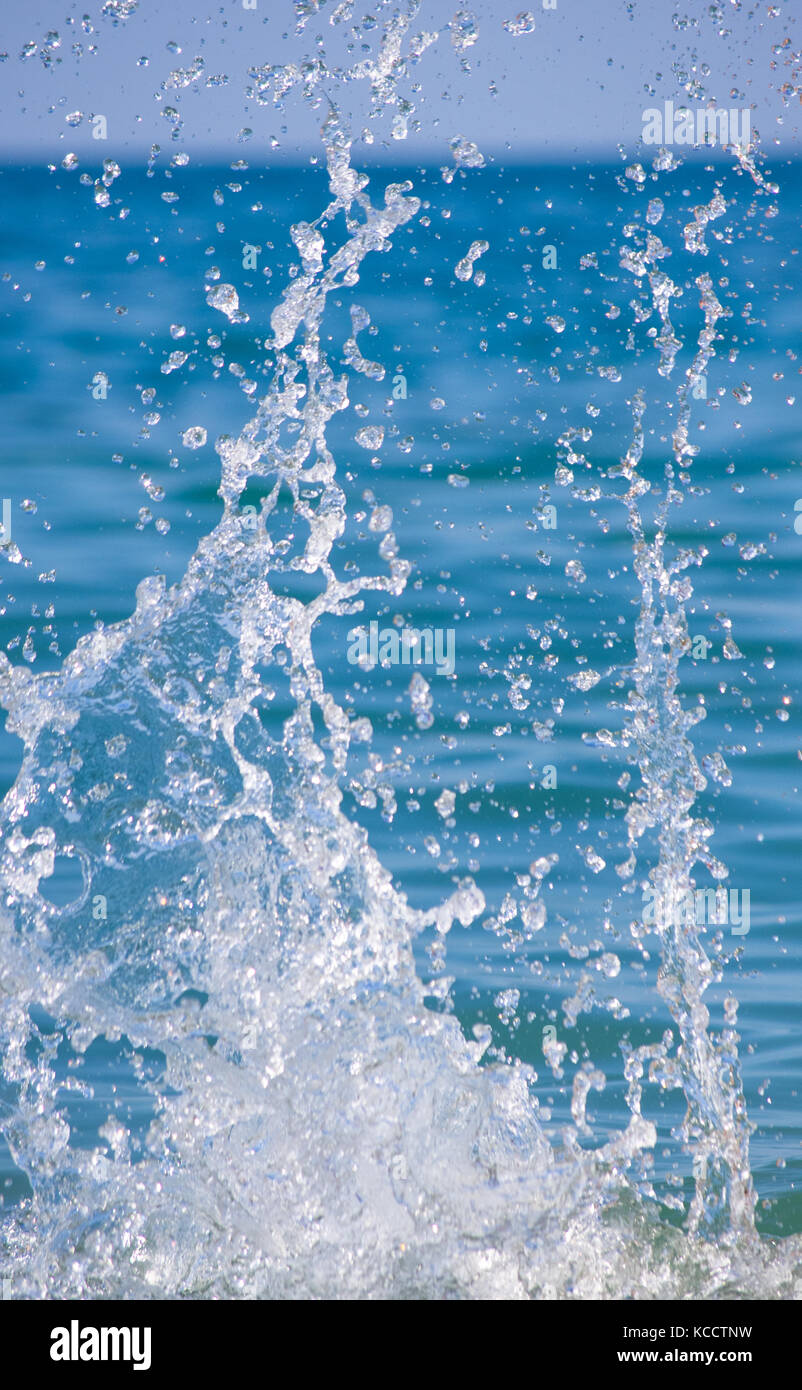 large transparent splashes sea water on a warm Sunny day, close-up ...