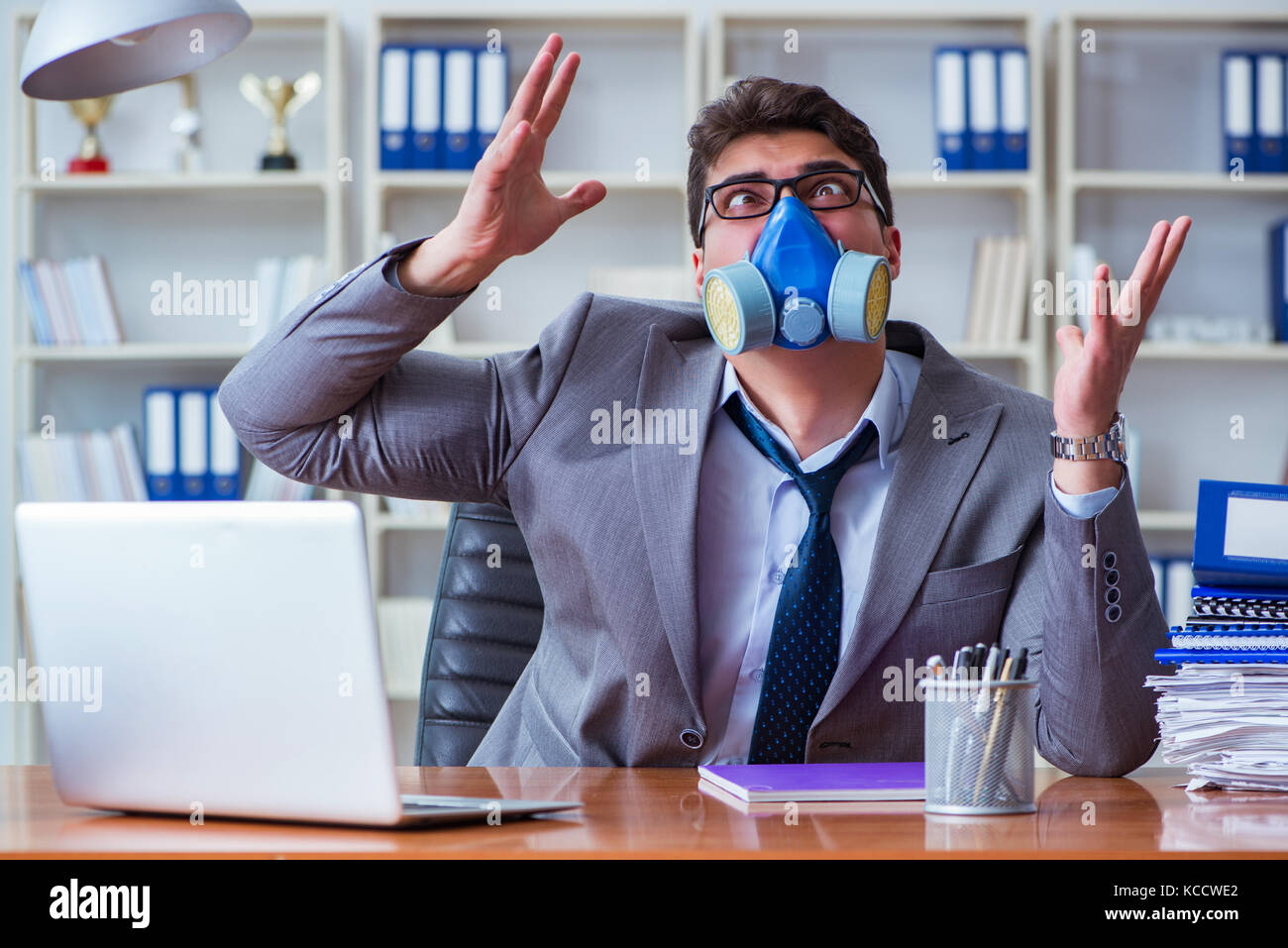 Businessman sweating excessively smelling bad in office at workplace ...