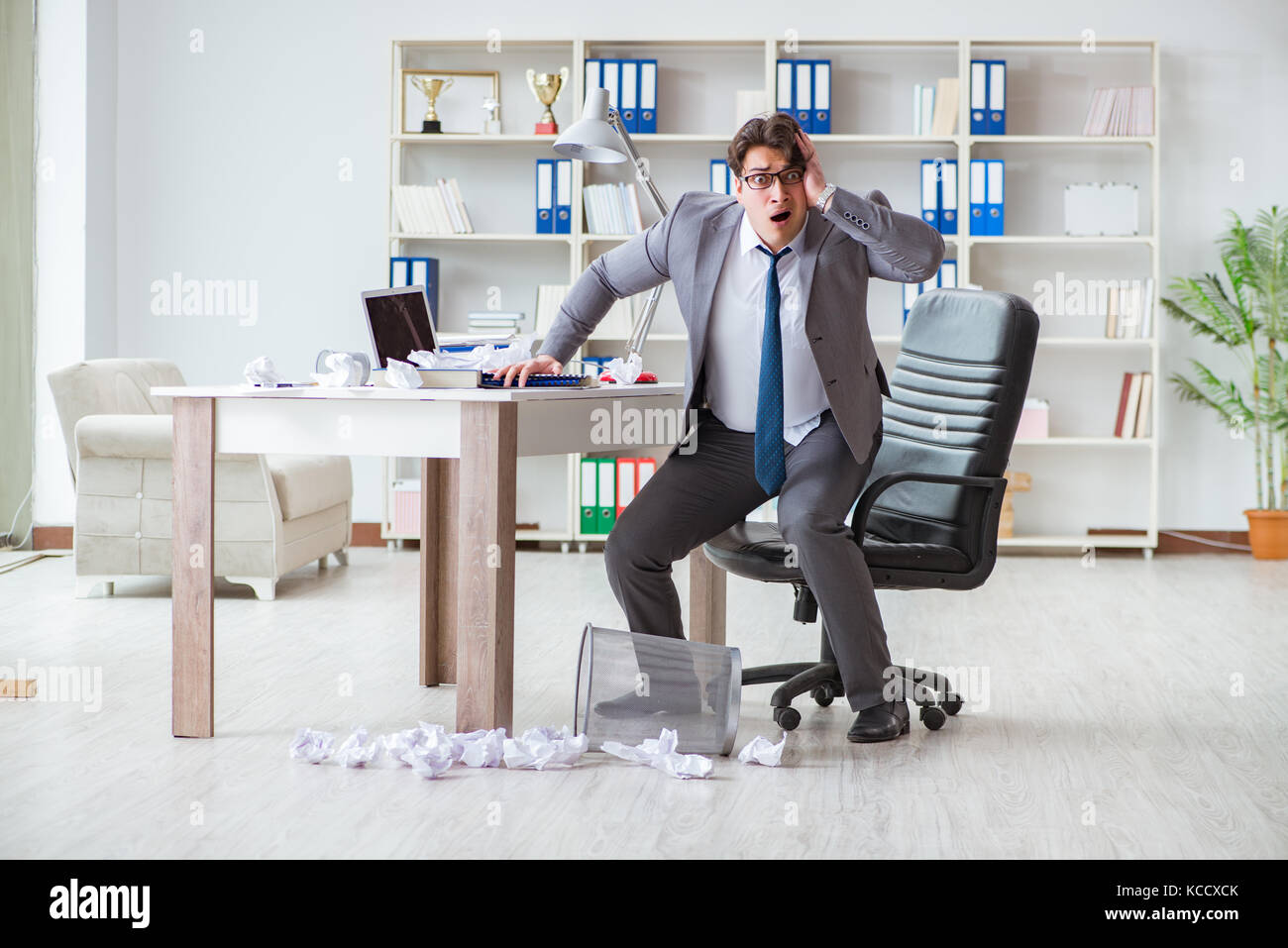 Angry businessman shocked working in the office fired sacked Stock ...