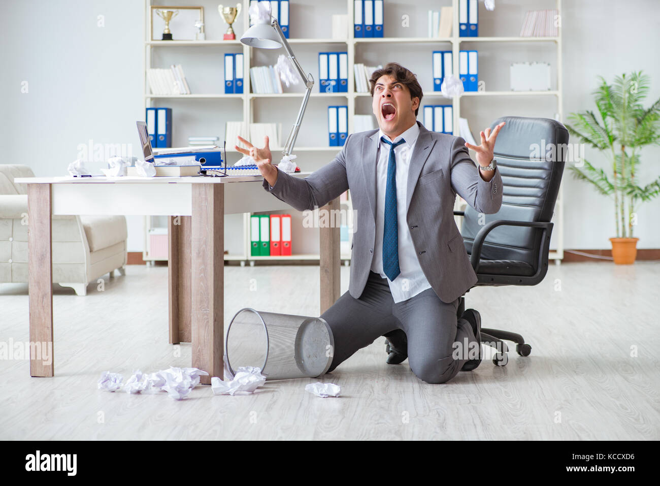 Angry businessman shocked working in the office fired sacked Stock ...