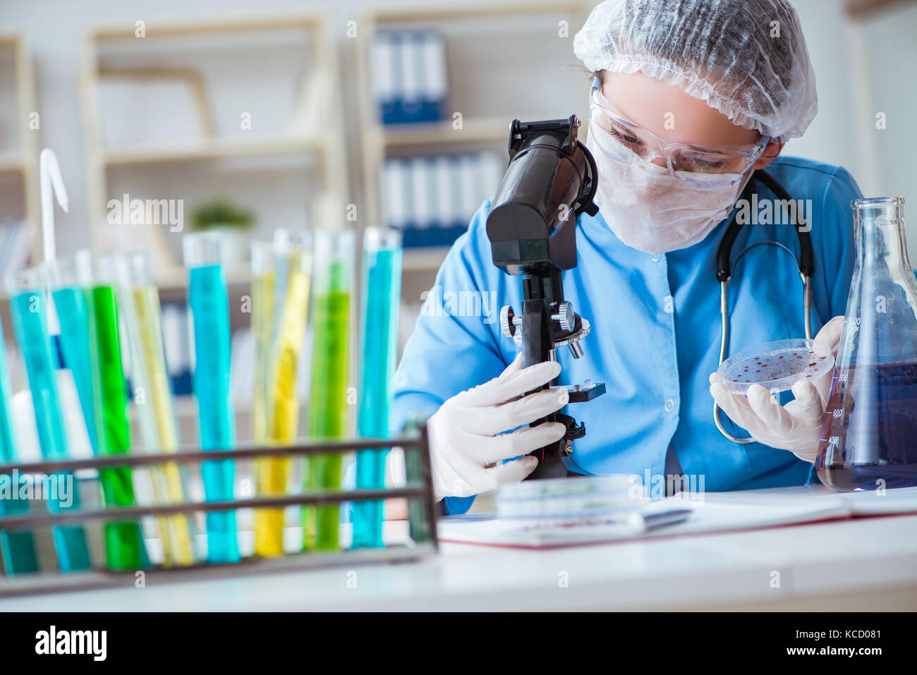 Female scientist researcher doing experiments in laboratory Stock Photo ...