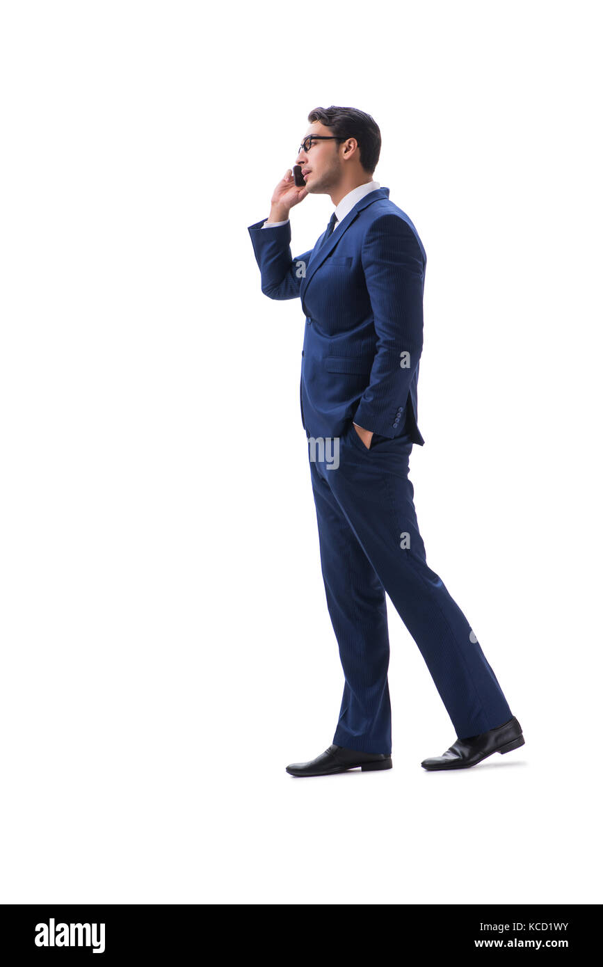 Businessman walking standing side view isolated on white background ...