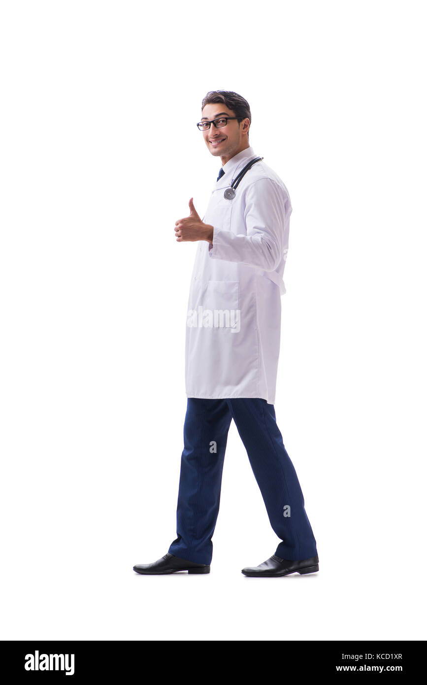 Young doctor physician standing walking isolated on white background ...