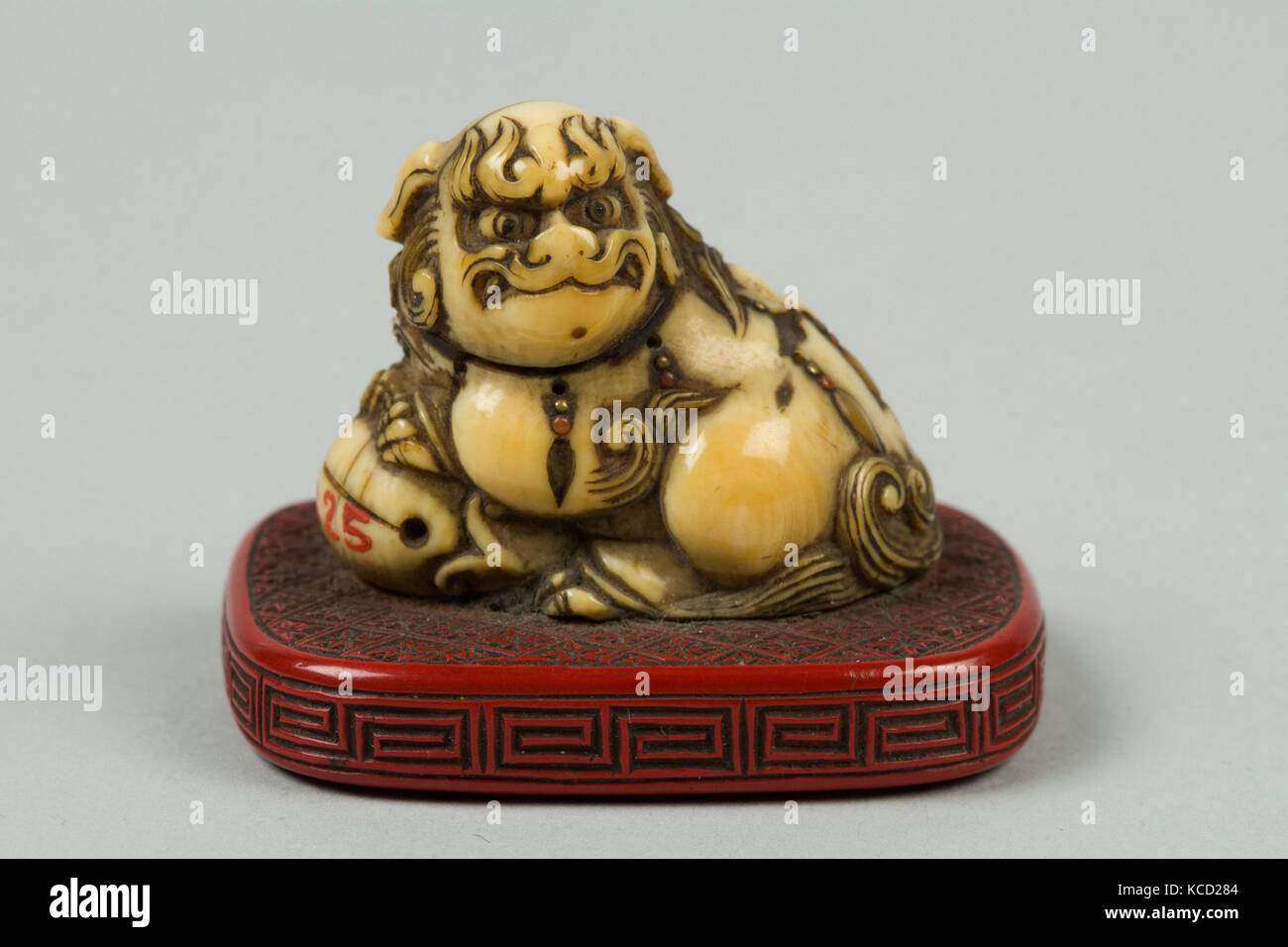 Netsuke of Qilin Sitting on a Nest, 19th century, Japan, Ivory, red ...