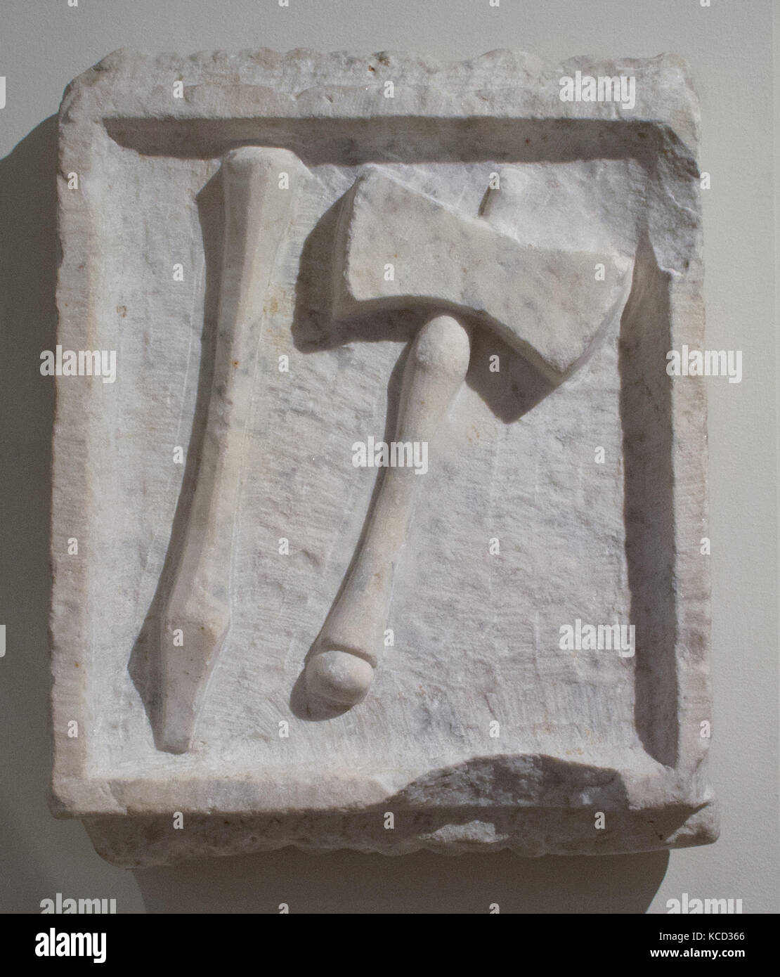Marble relief of a chisel and mallet, 2nd century A.D Stock Photo - Alamy
