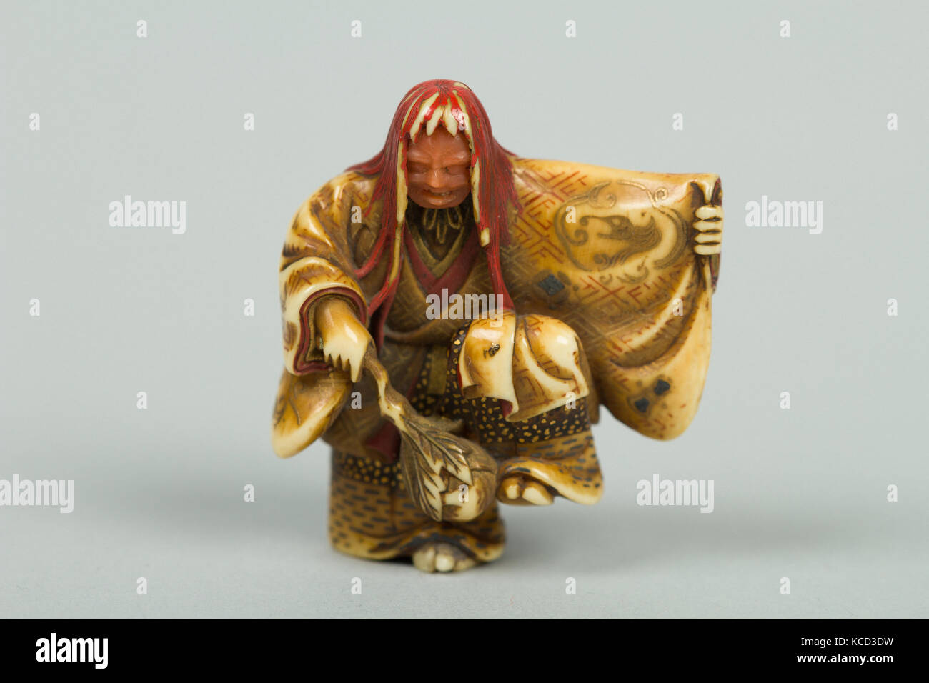 Netsuke of Noh Dancer with Long Red Hair and Peony, 19th century Stock ...