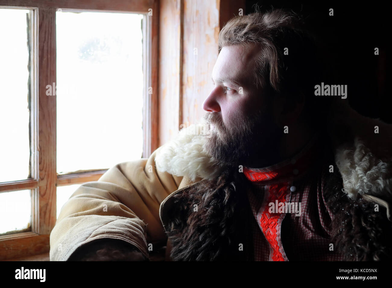 man in traditional winter costume of peasant medieval age in rus Stock ...