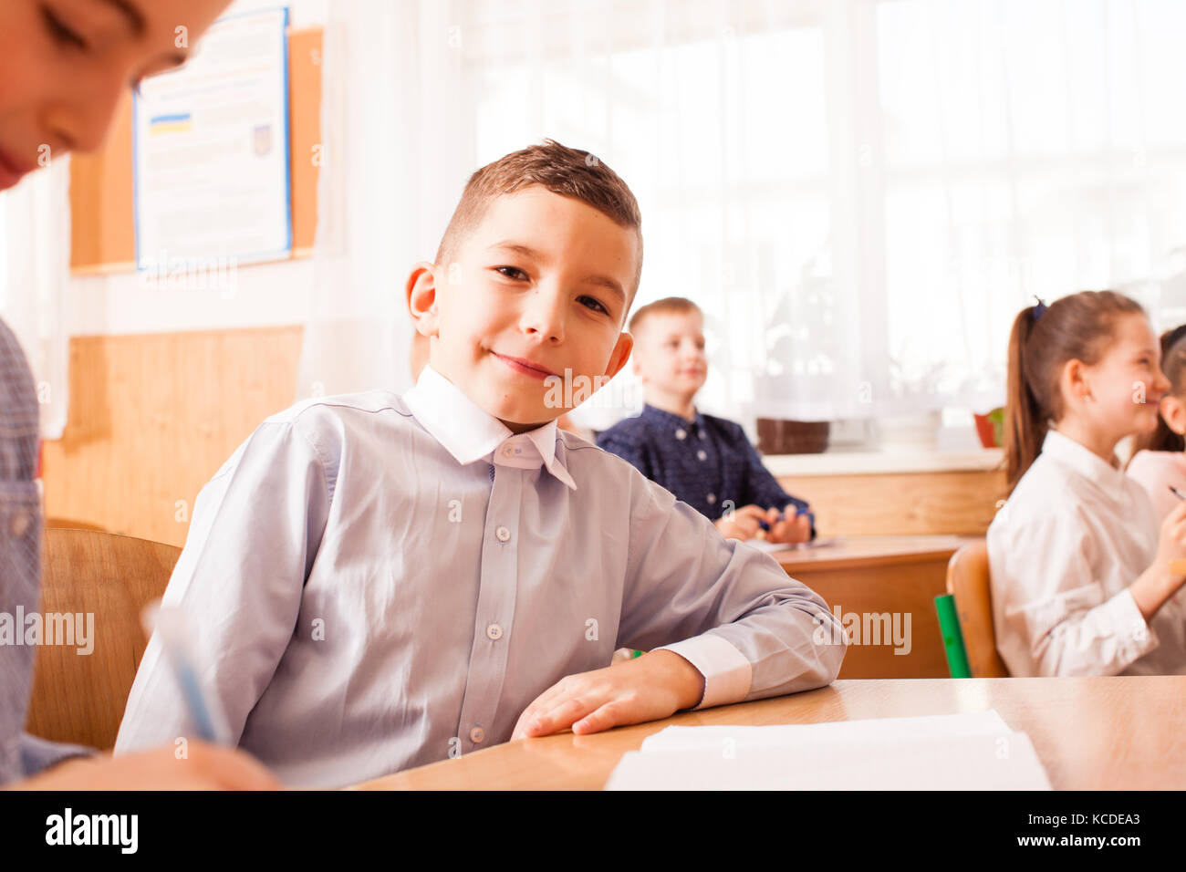Boy write in the copybook Stock Photo - Alamy