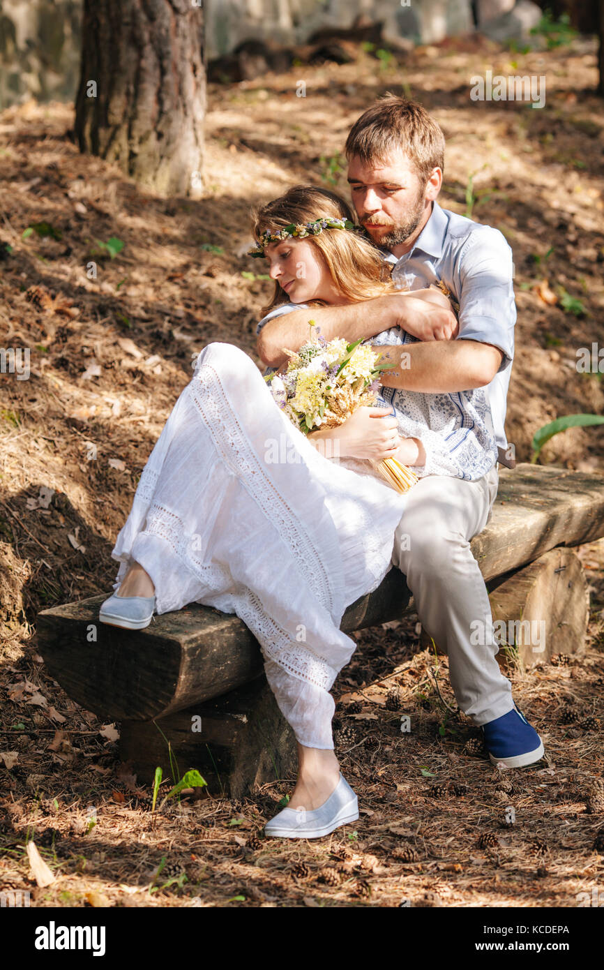 Eclectic rustic wedding couple Stock Photo - Alamy