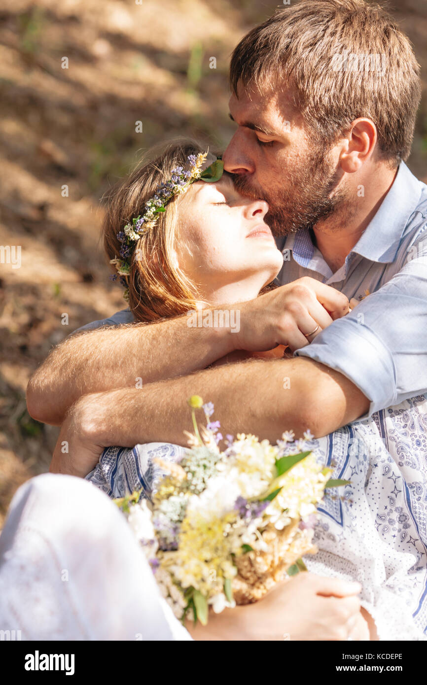 Eclectic rustic wedding couple Stock Photo - Alamy