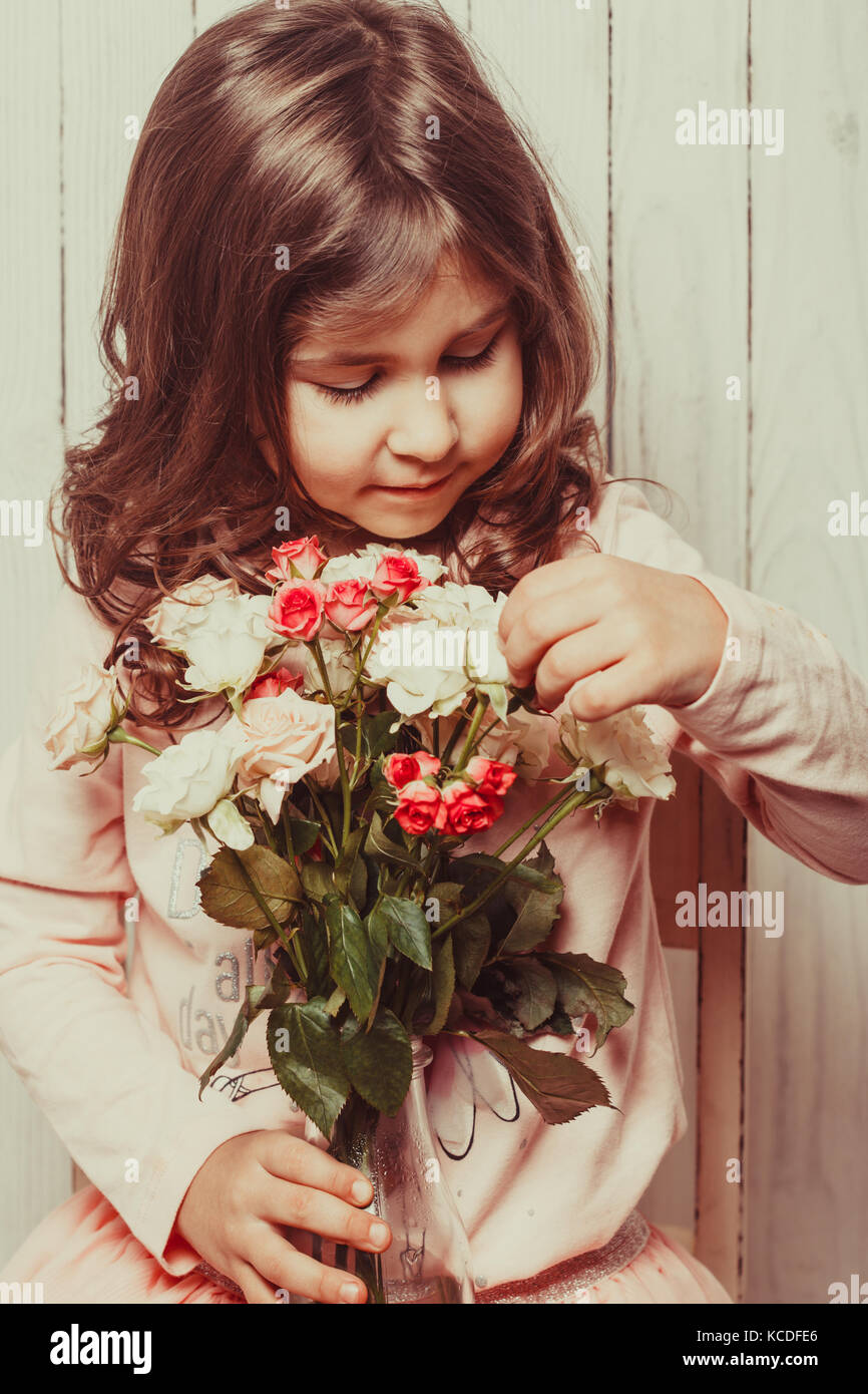Girl with roses Stock Photo - Alamy