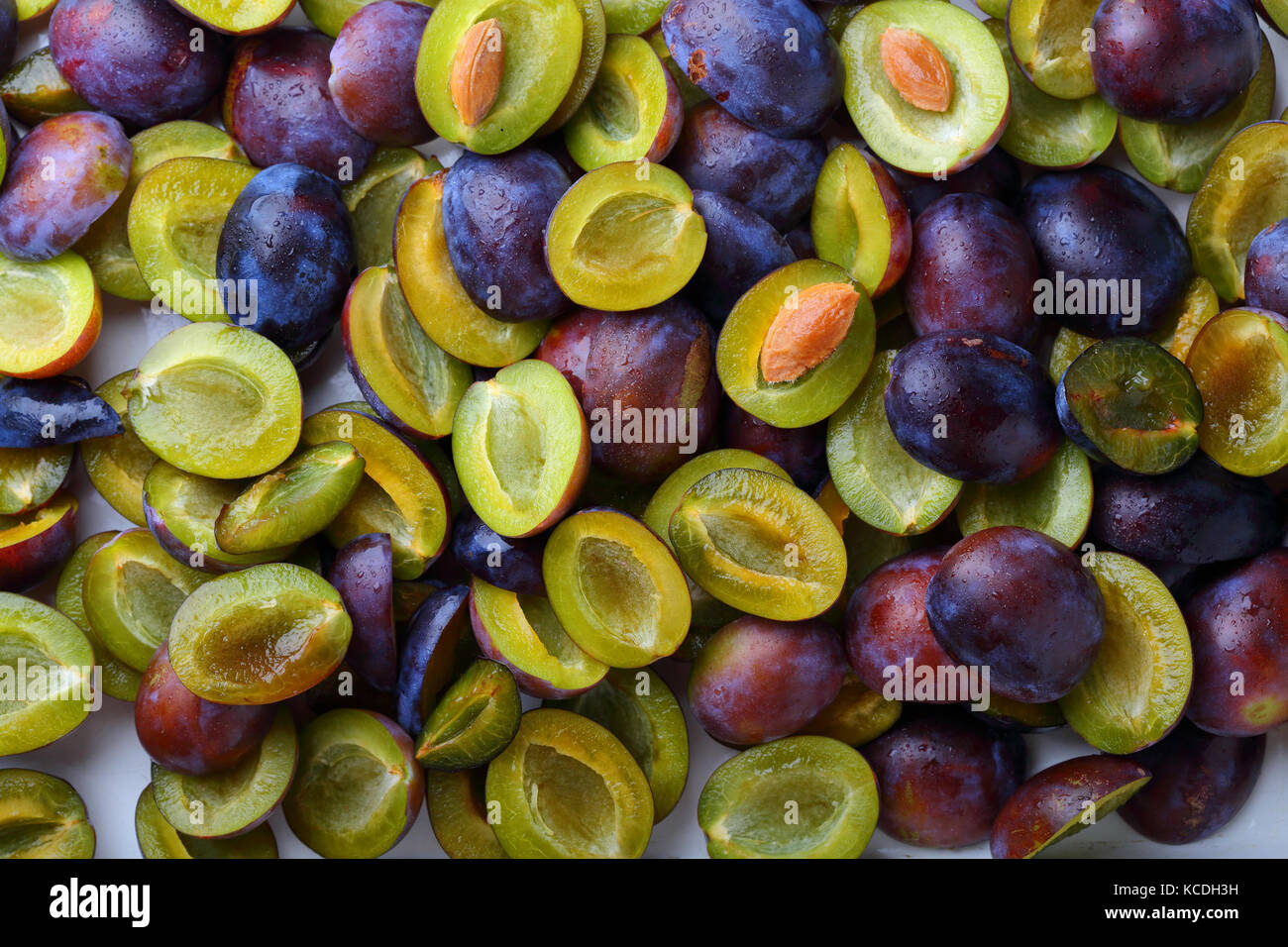 Raw plums hi-res stock photography and images - Alamy