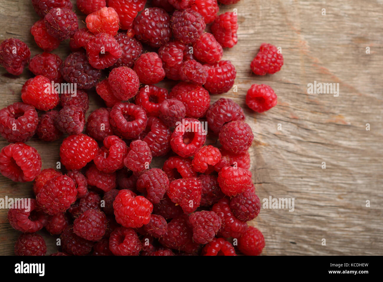 Wood fruits background, berry above Stock Photo - Alamy