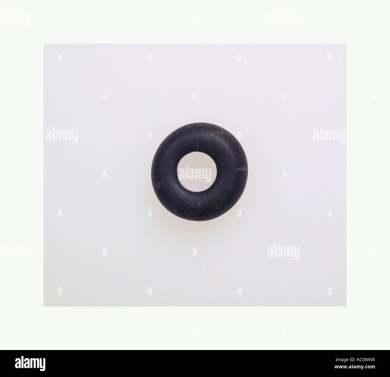 Bead, Roman, Glass, Diam.: 1 x 3/8 in. (2.6 x 1 cm), Glass Stock Photo ...