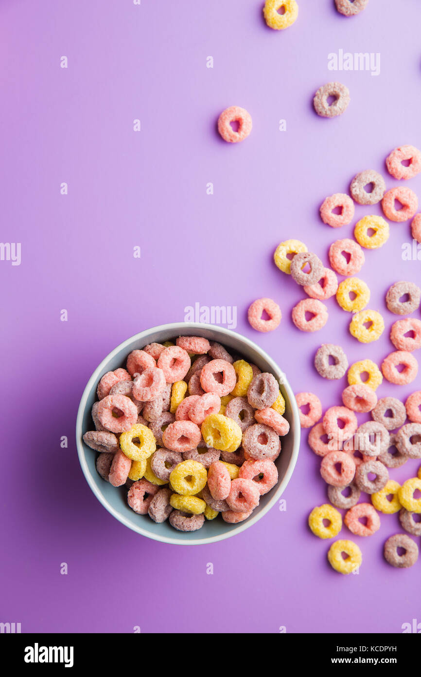 Colorful cereal rings on colorful background Stock Photo - Alamy