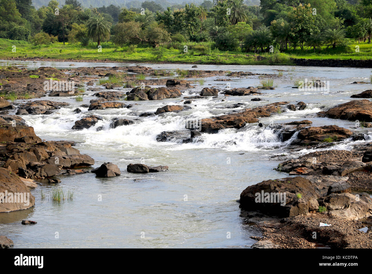 Water flowing from stone Stock Photo - Alamy