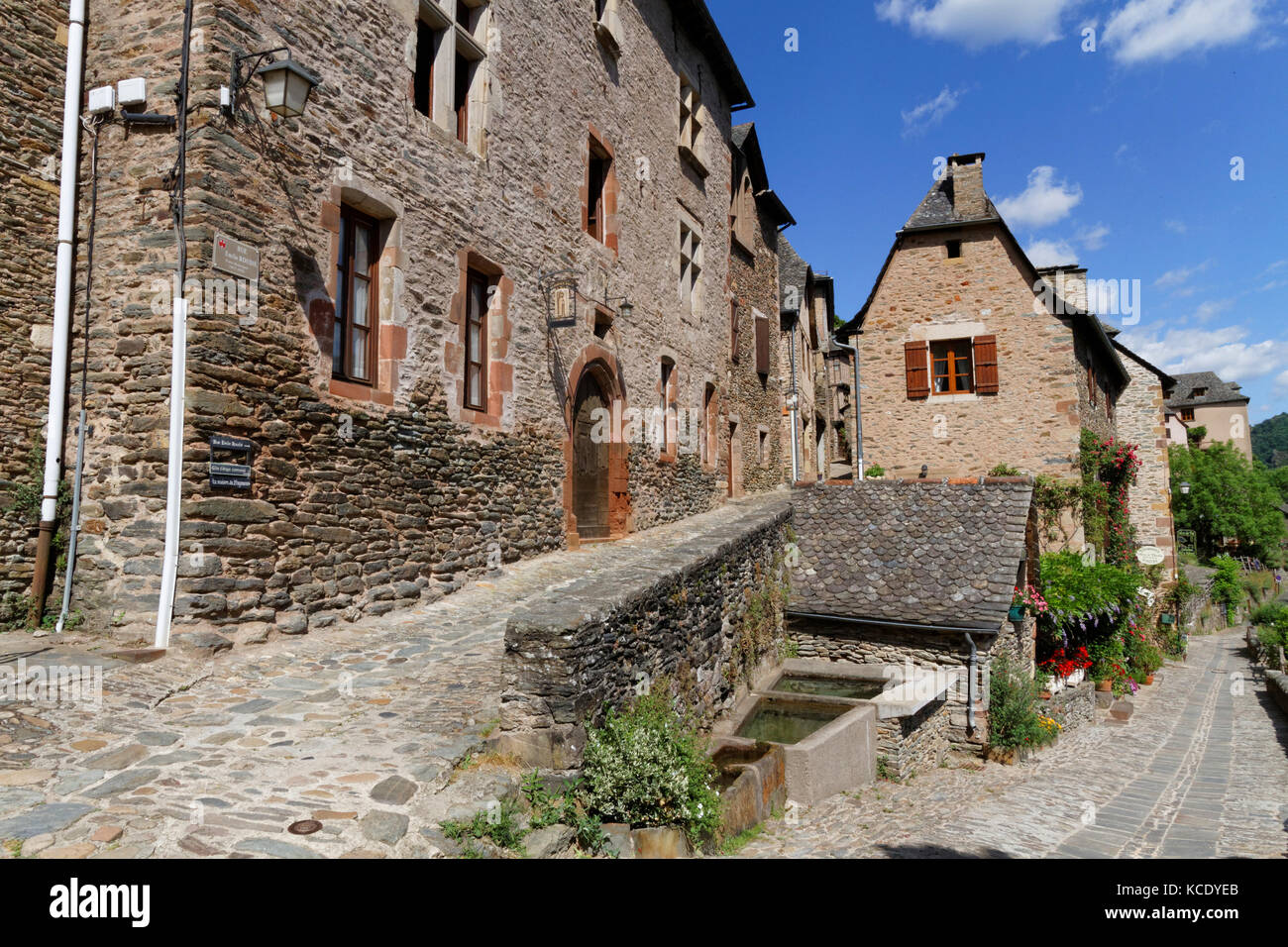 CONQUES, FRANCE, June 19, 2015 : Conques is built on a hillside and has ...
