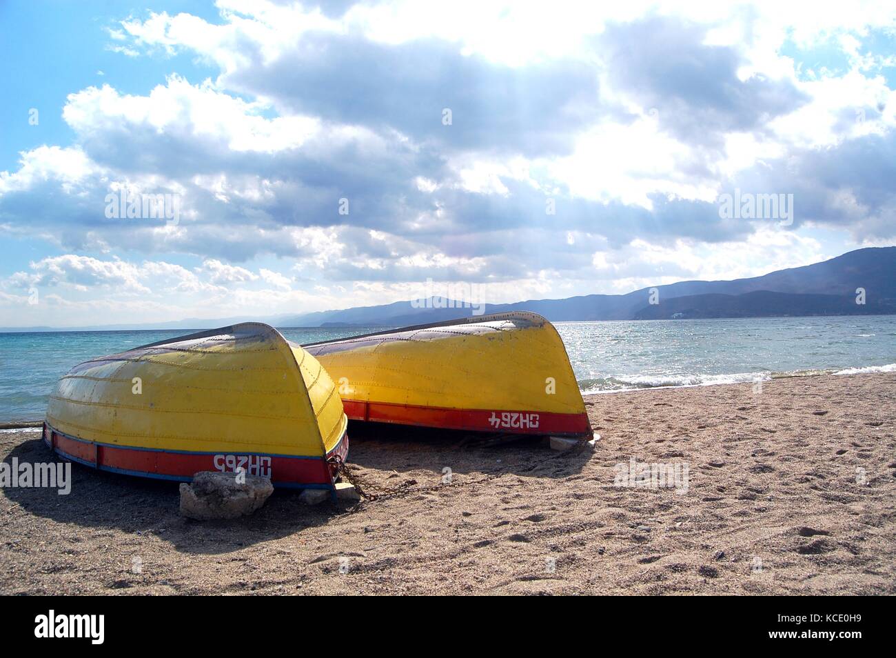 Boat on a beach od Lake Ohrid, Macedonia, view from Struga city ...