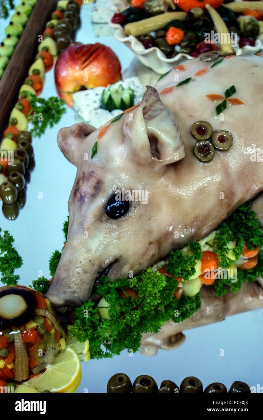 Picture of a fresh Grilled and served pig in aplate Stock Photo - Alamy
