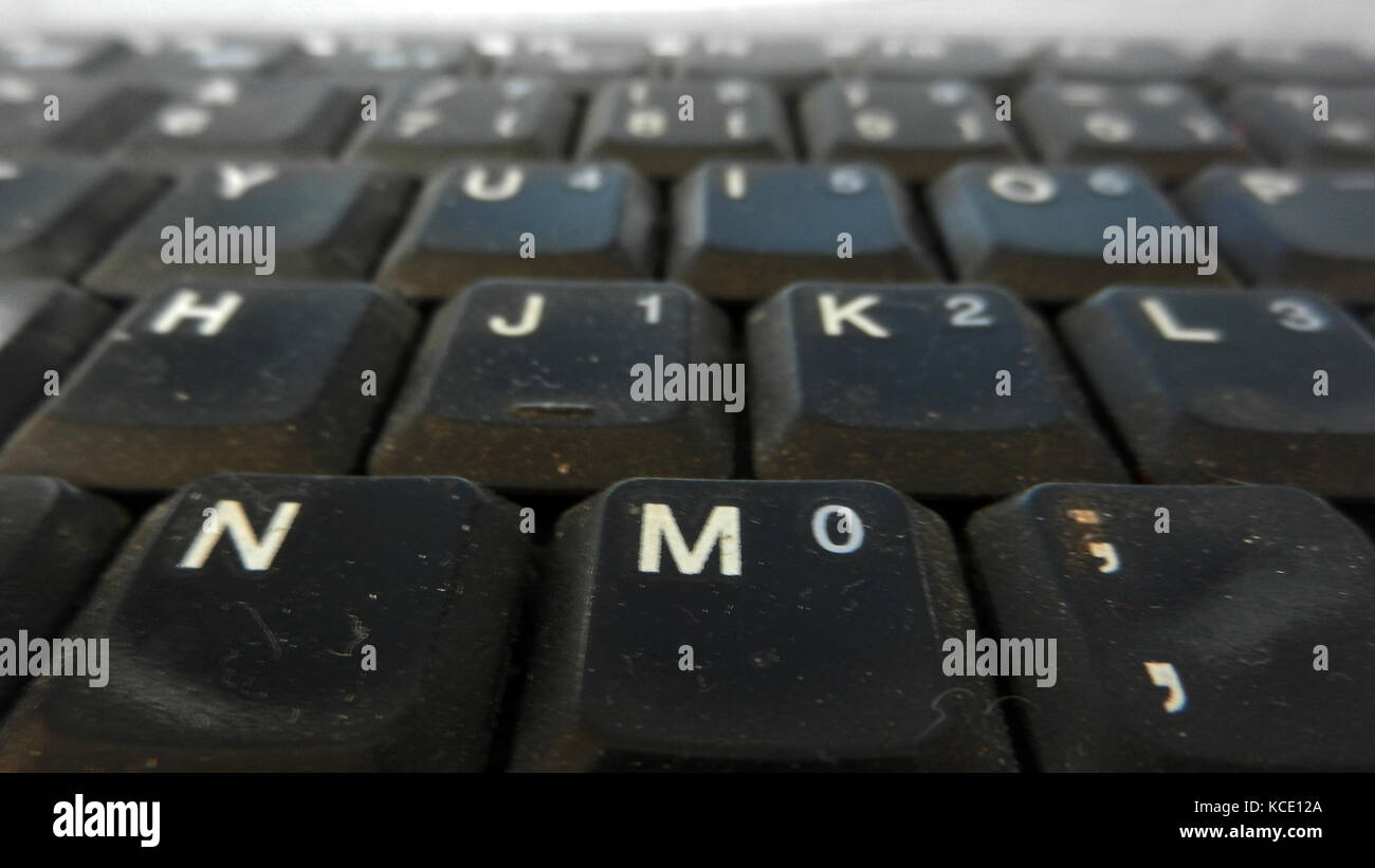 Old Black laptop keyboard, dusty and dirty Stock Photo - Alamy