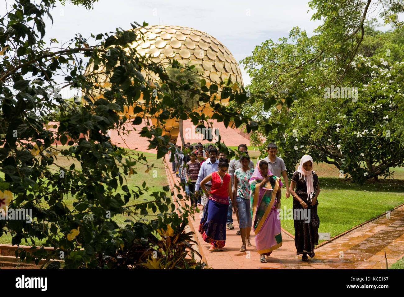AUROVILLE, INDIA: Tourists in front of the Matrimandir, the meditation ...