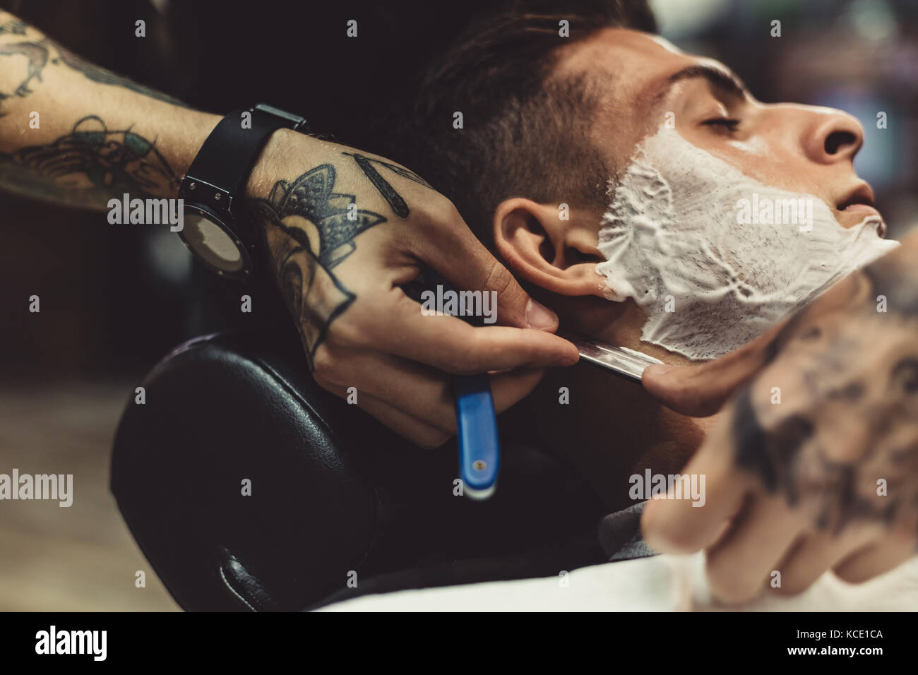 Barber shaving client Stock Photo - Alamy Barber shaving client Stock Photo - Alamy