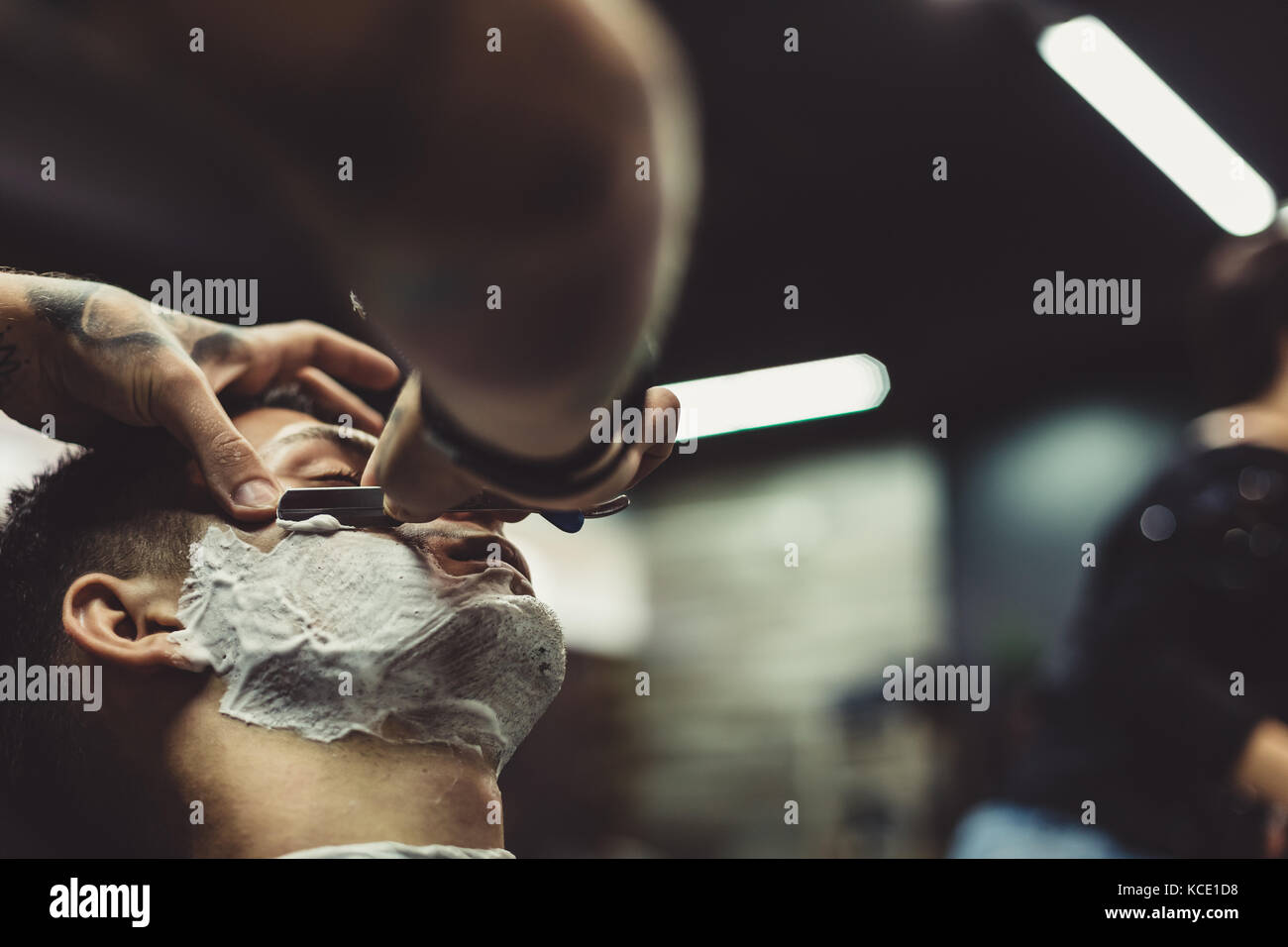 Barber shaving client Stock Photo - Alamy Barber shaving client Stock Photo - Alamy